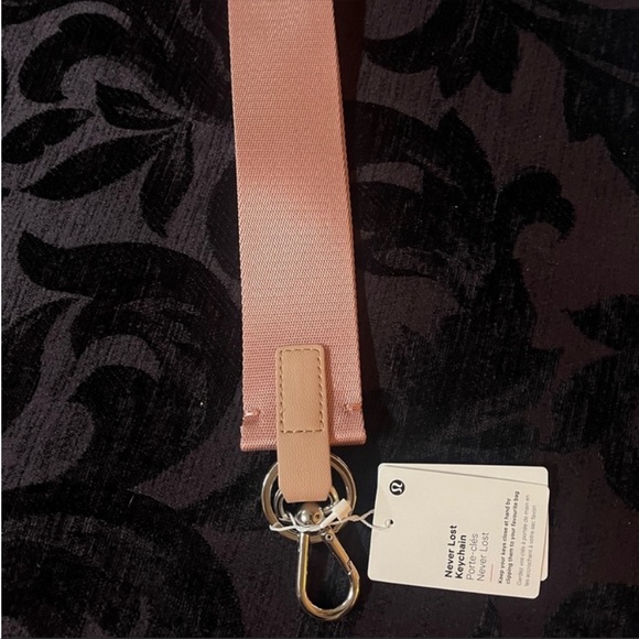 lululemon athletica | Accessories | Nwt Lululemon Never Lost Keychain ...